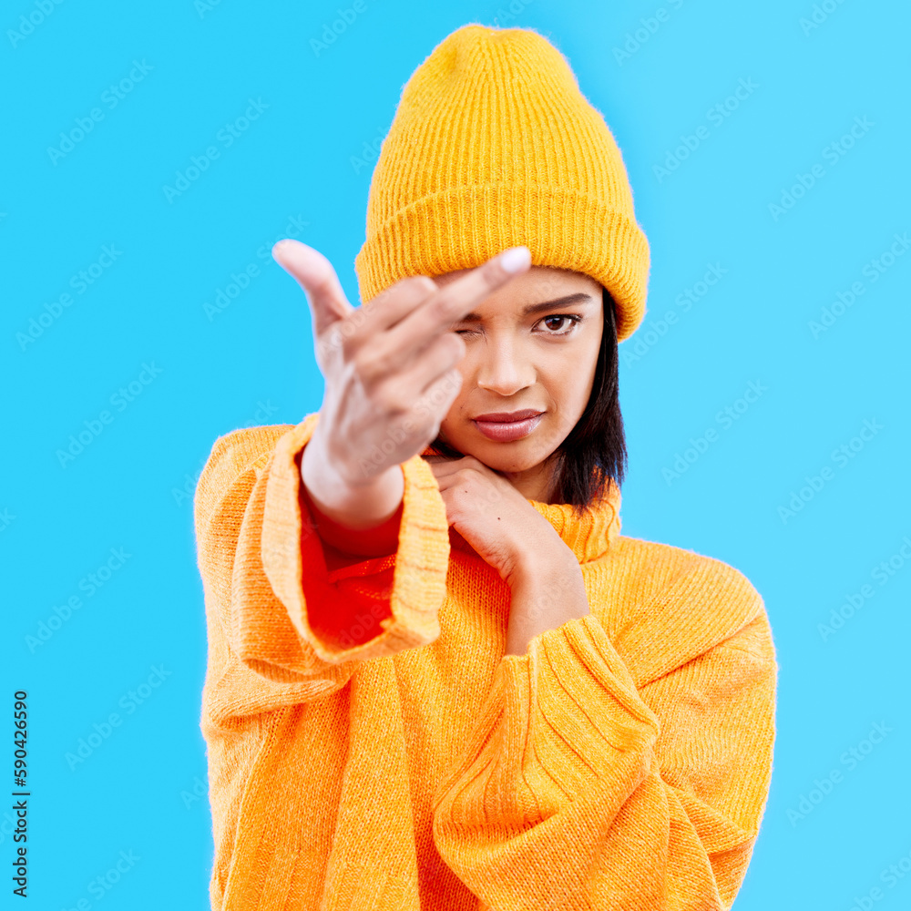 Portrait, hand gesture and rude with a woman on a blue background in ...