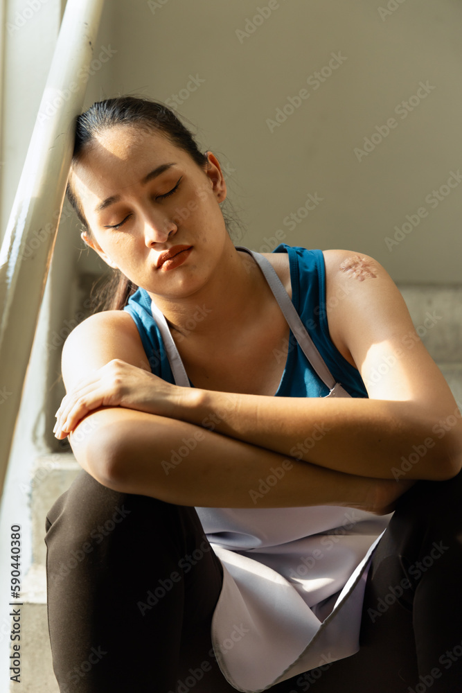 Sad unhappy and depressed Asian cleaning service worker woman, concept ...