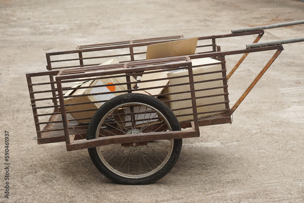 Wheel cart carries paper boxes. Concept, DIY vehicle made from recycled ...