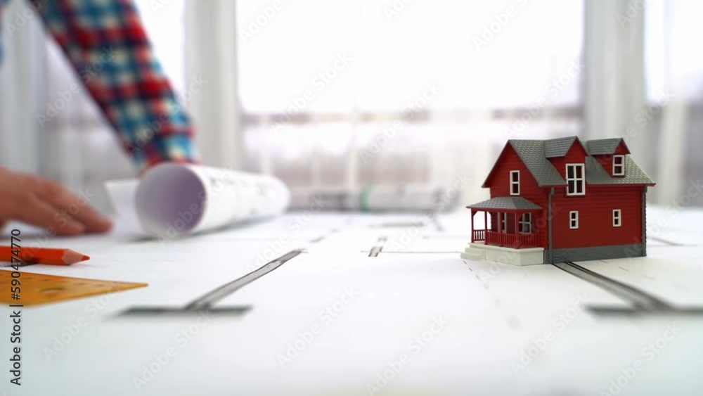 the architect is working on an architectural and construction project ...