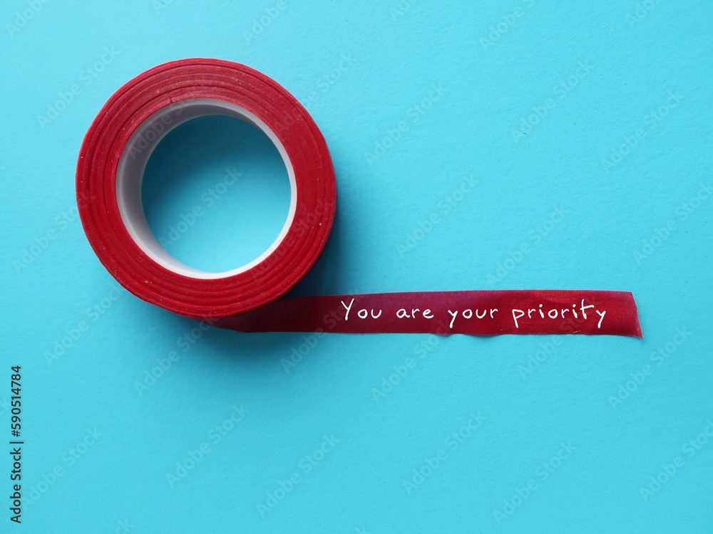 Fotografia do Stock: Red tape on blue background with handwritten text ...