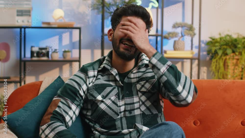 Indian man laughing out loud after hearing ridiculous anecdote, funny ...