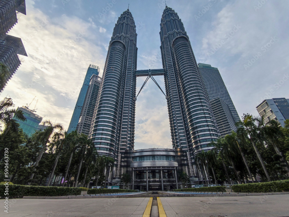 Petronas Twin Towers and KLCC Twin Towers in the city of Kuala Lumpur ...