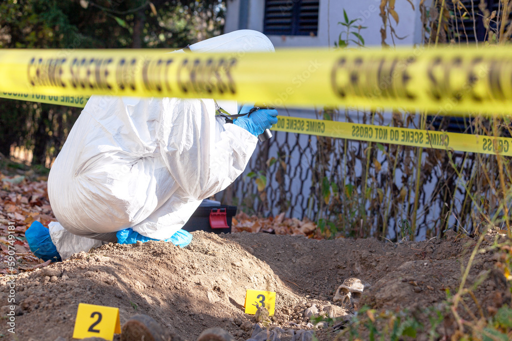 Crime scene investigation. Forensic science specialist working on human ...