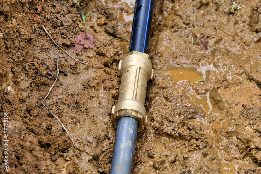 Brass joint connector attached to the old and new water pipe Stock ...