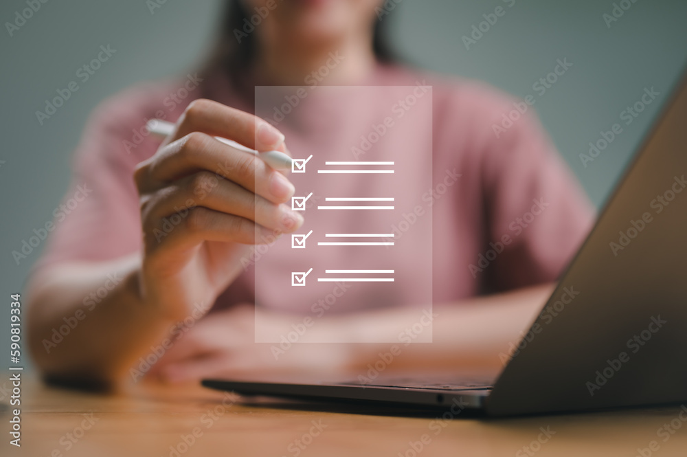 Business performance checklist, businessman using laptop doing online ...