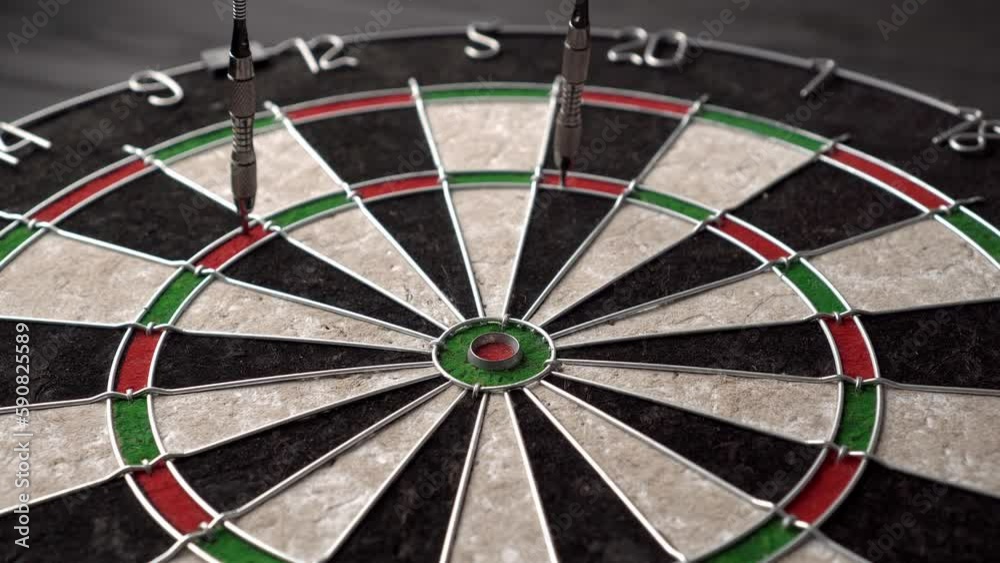 Three darts hit the dartboard. Lucky - one of the darts hits the bull's ...