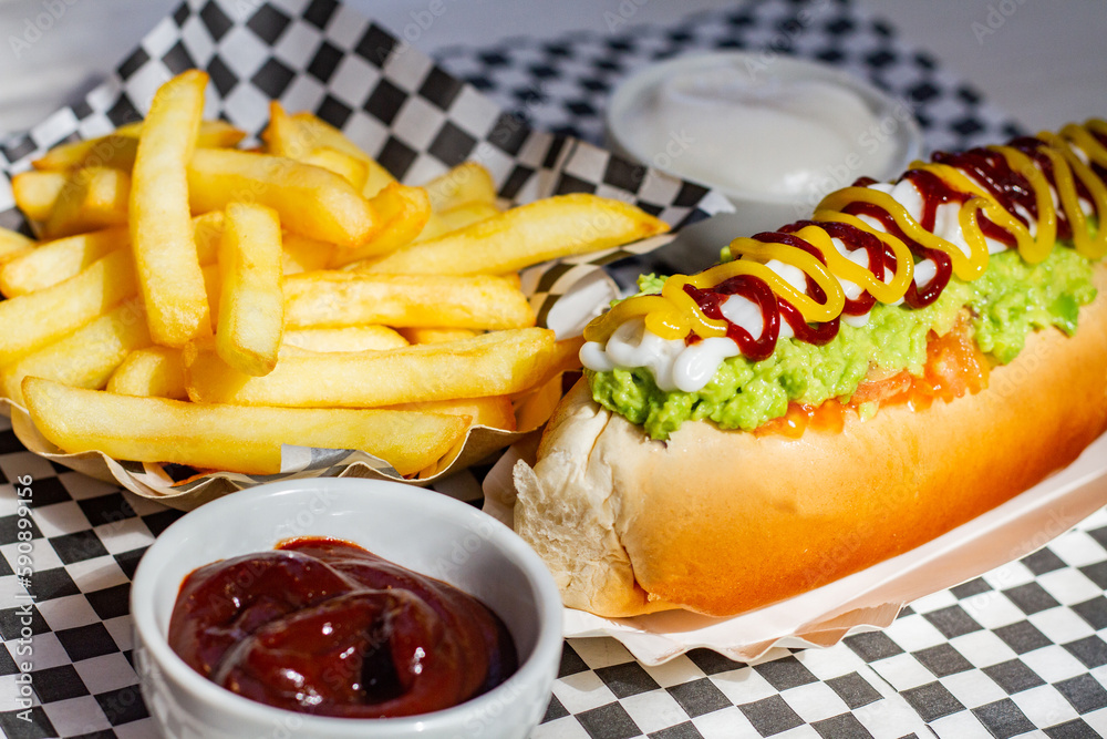 Completo italiano con papas fritas y ketchup Stock Photo | Adobe Stock