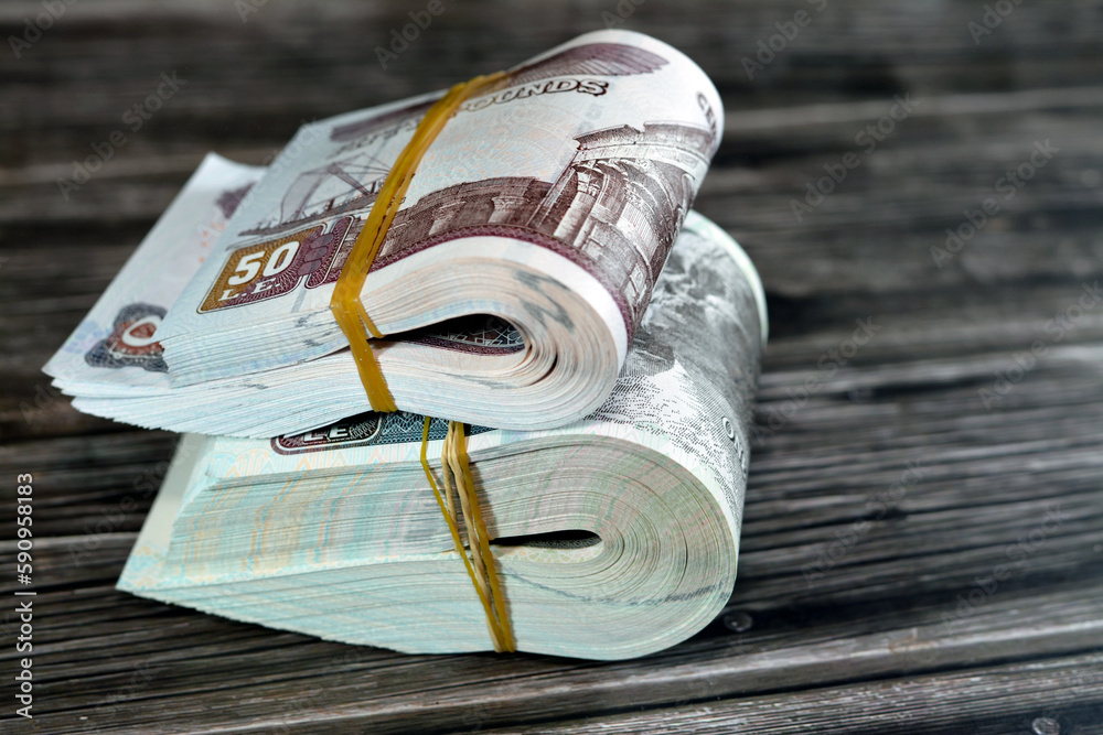 Egypt money folded bundles banknote bills of 100 and 50 EGP LE one ...