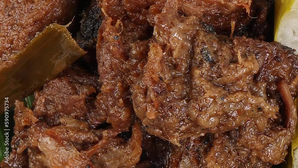 Video Stock beef rendang curry cooked spice and coconut milk with pulut ...