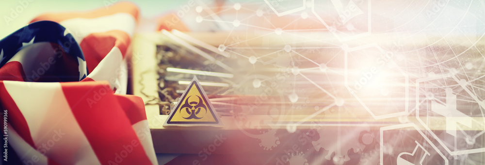 American flag, test tubes and biohazard sign. The concept of American ...