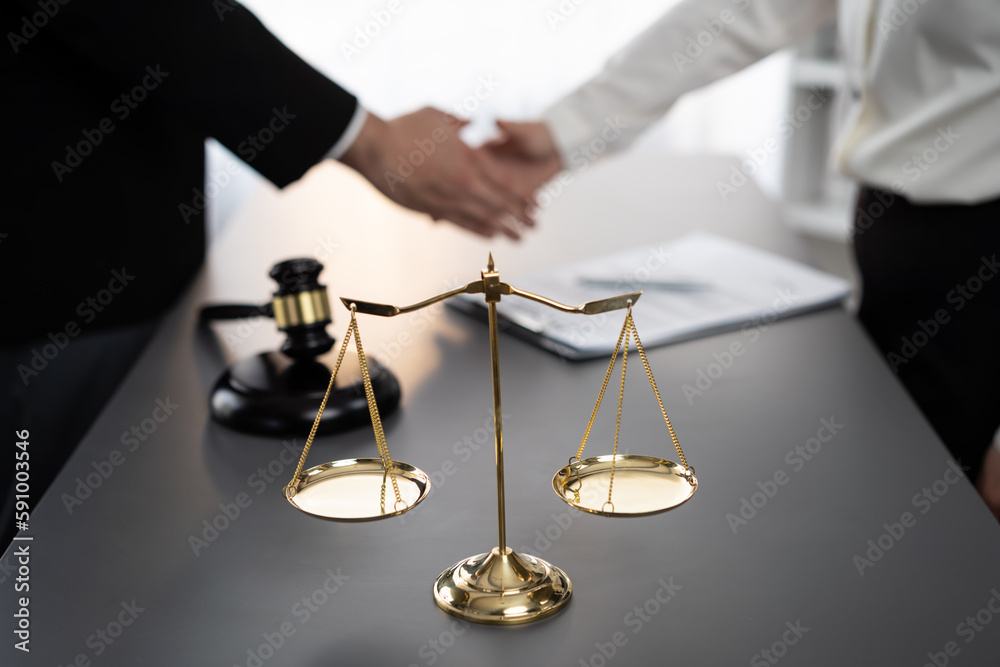 Focus gavel and justice scale on blur background of lawyer colleagues ...