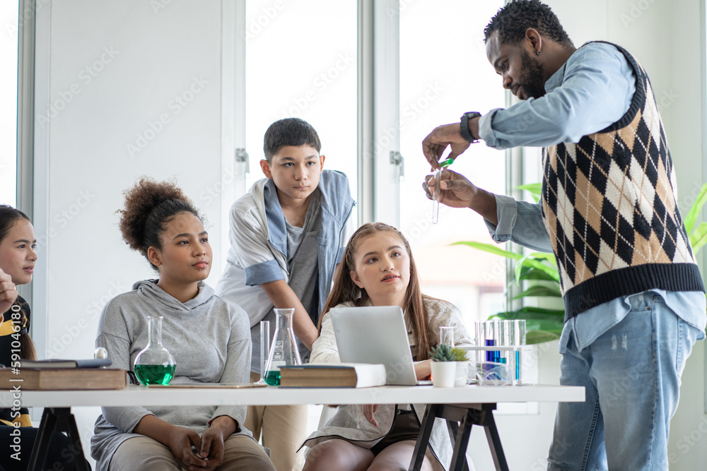 Fotografia do Stock: Group of student in the classroom listening ...