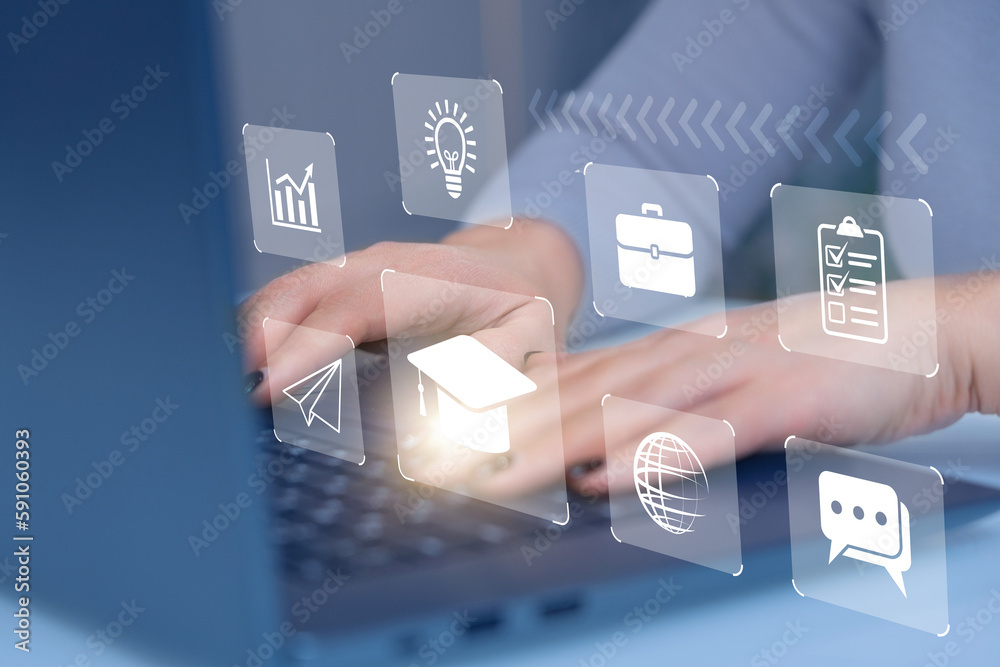 Business woman uses computer to study lessons on Internet, concept of e ...