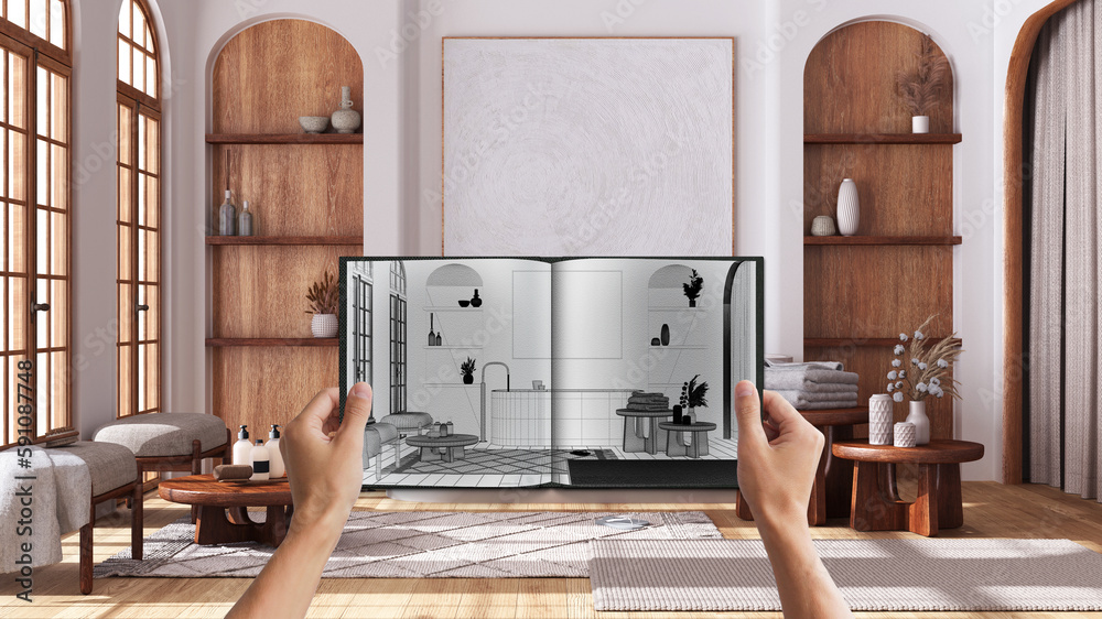 Hands holding notepad with creative bathroom design blueprint sketch or ...