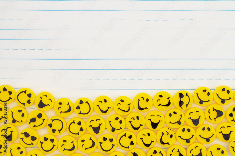 Yellow happy buttons border on lined paper Stock Photo | Adobe Stock