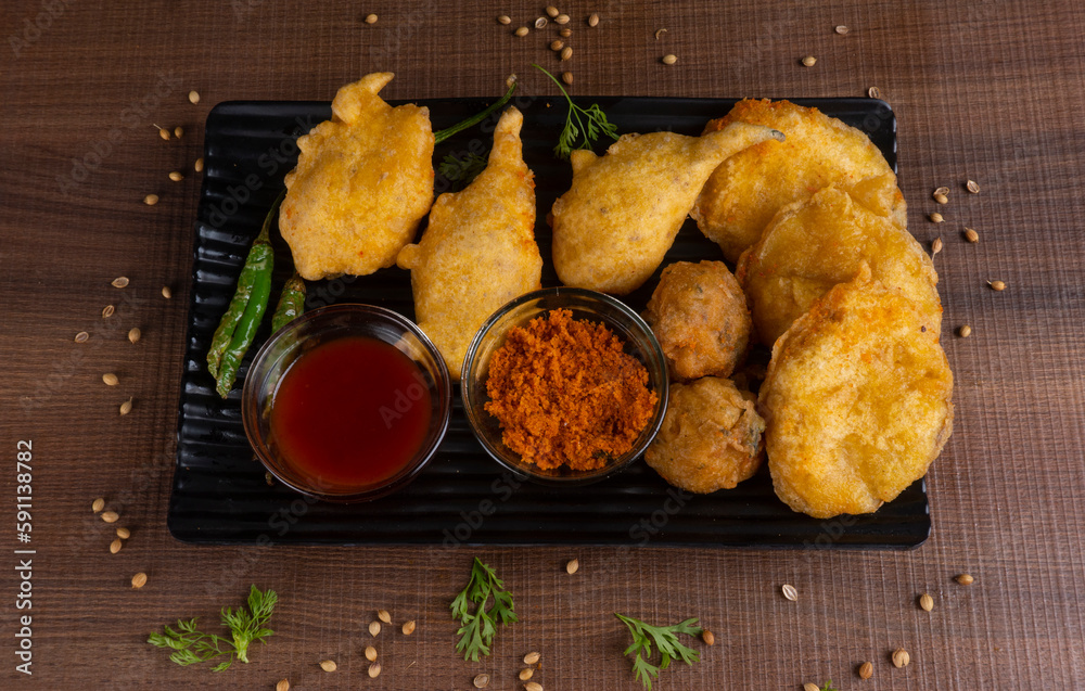 Indian Tea time snacks in group includes Veg Samosa, Kachori/kachaudi ...