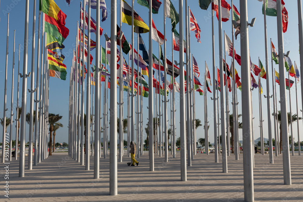 Doha, Qatar - December 12 2022: Flags of countries in the old port of ...