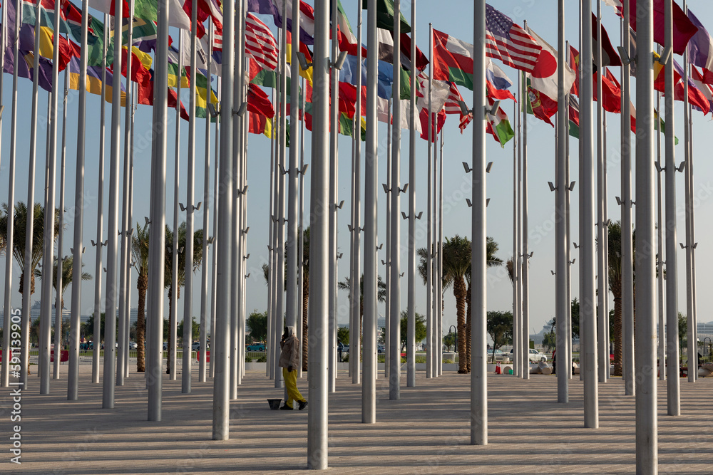 Doha, Qatar - December 12 2022: Flags of countries in the old port of ...