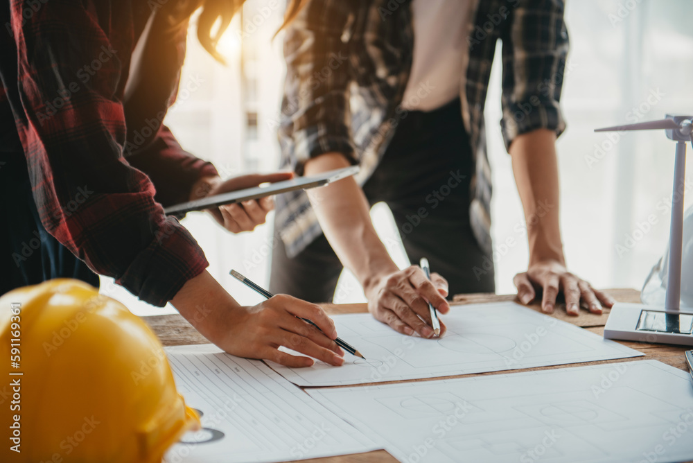 Engineer teams meeting working together wear worker helmets hardhat on ...