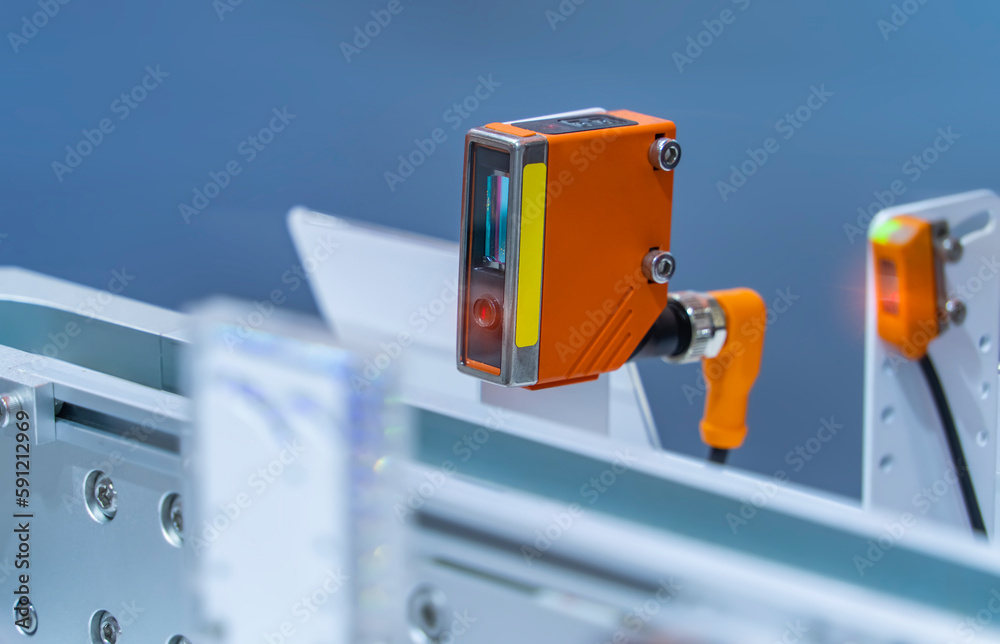 transducer on industrial machine robot in assembly line working in ...