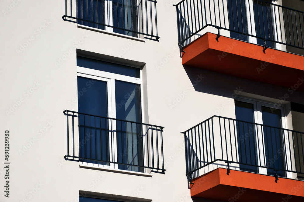 red textured stucco balcony slabs. steel picket railing. perspective ...