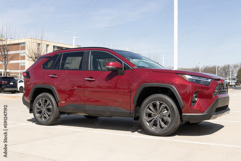 Toyota RAV4 Hybrid display at a dealership. Toyota offers the RAV4 in ...