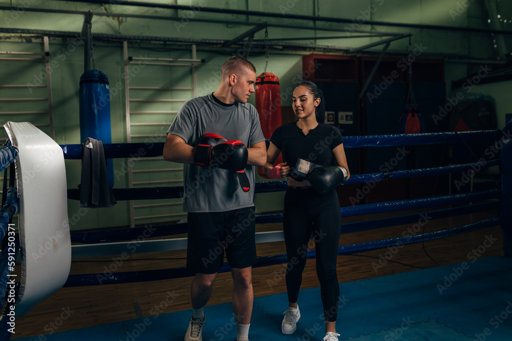 Two beautiful people are training boxing together Stock Photo | Adobe Stock