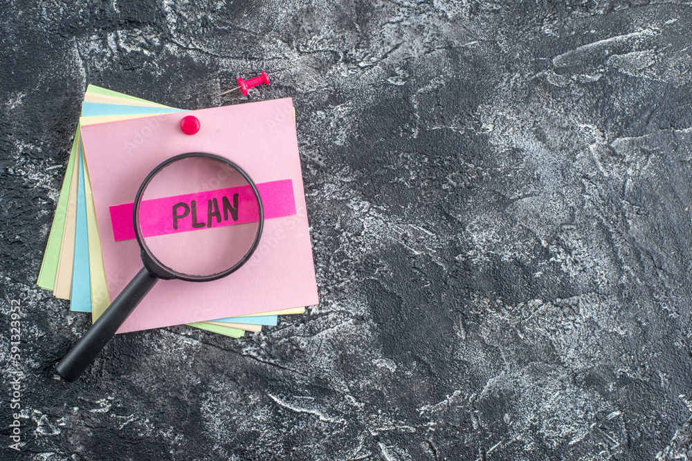 top view plan written note on sticker on gray background paper college ...