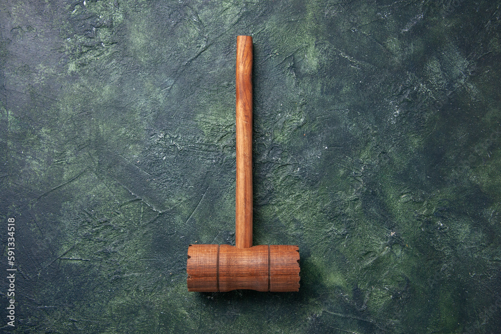 top view wooden hammer for meat beating on dark background kitchen ...