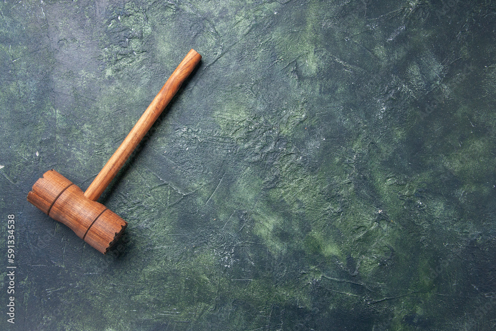 top view wooden hammer for meat beating on dark background kitchen ...