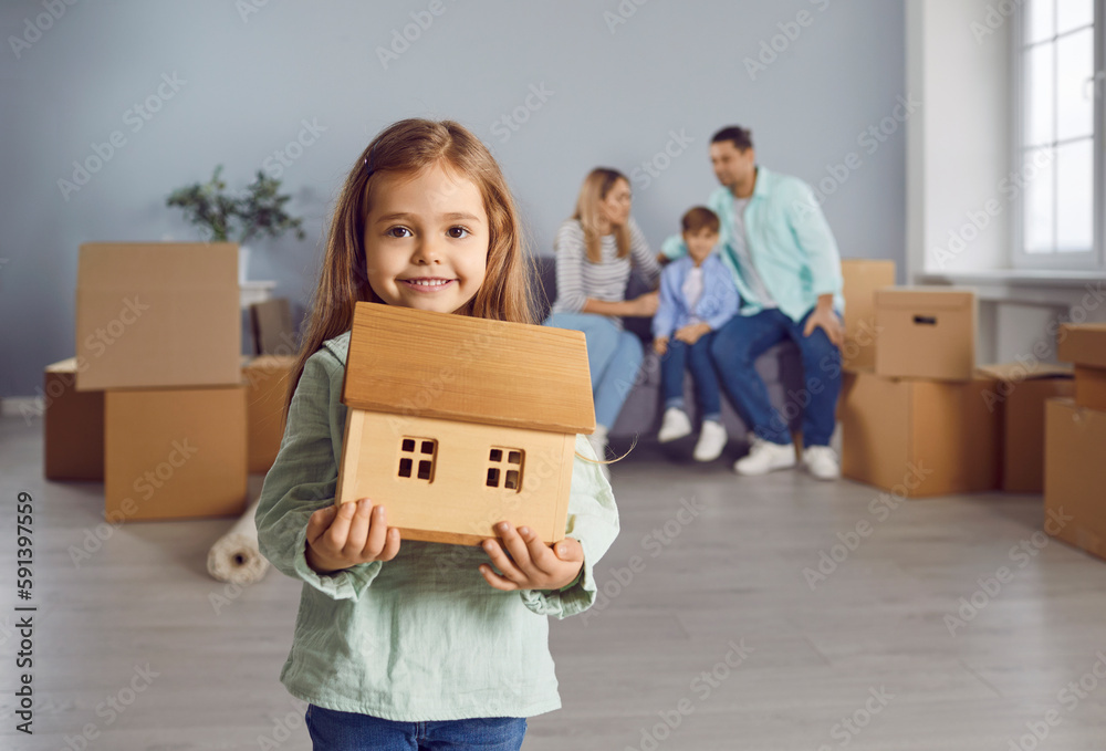Happy child in new house or apartment. Portrait of beautiful little ...