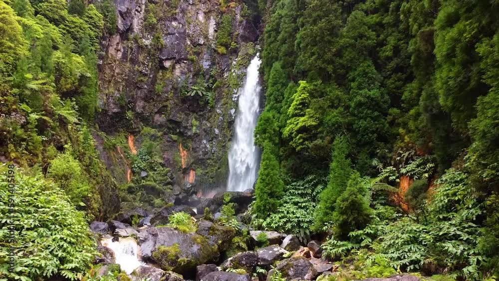 Waterfall in Sao Miguel, Azores. Track of water fall amidst beautiful ...