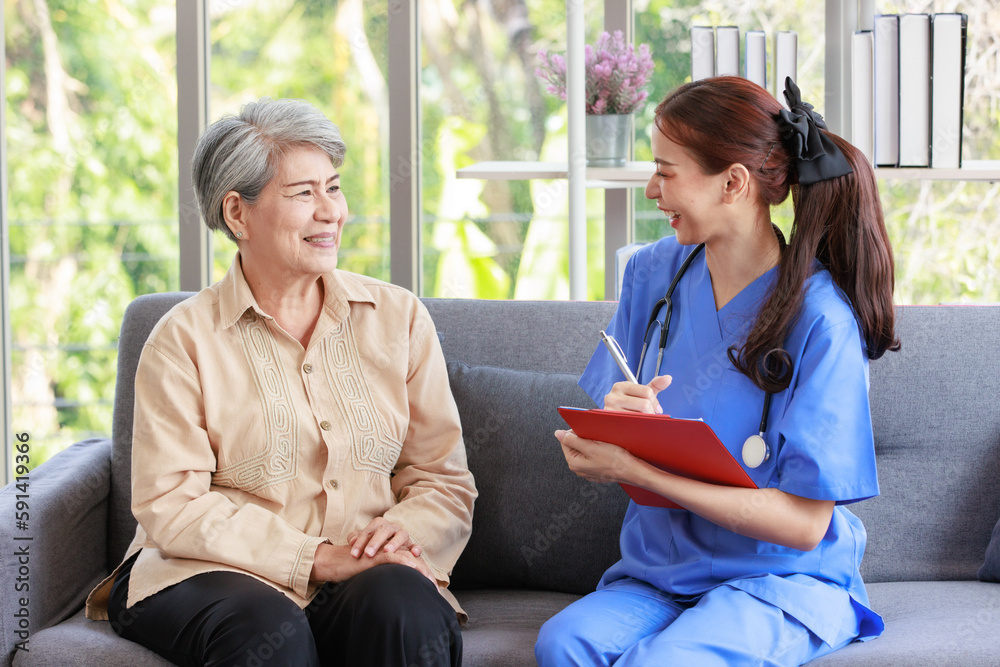 Asian professional successful female intern nurse in blue uniform with ...