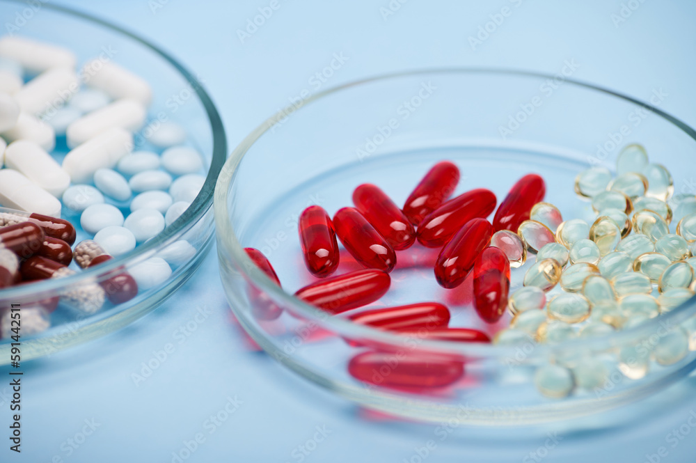 Still life with assortment of pharmaceutical pills and gel capsules ...
