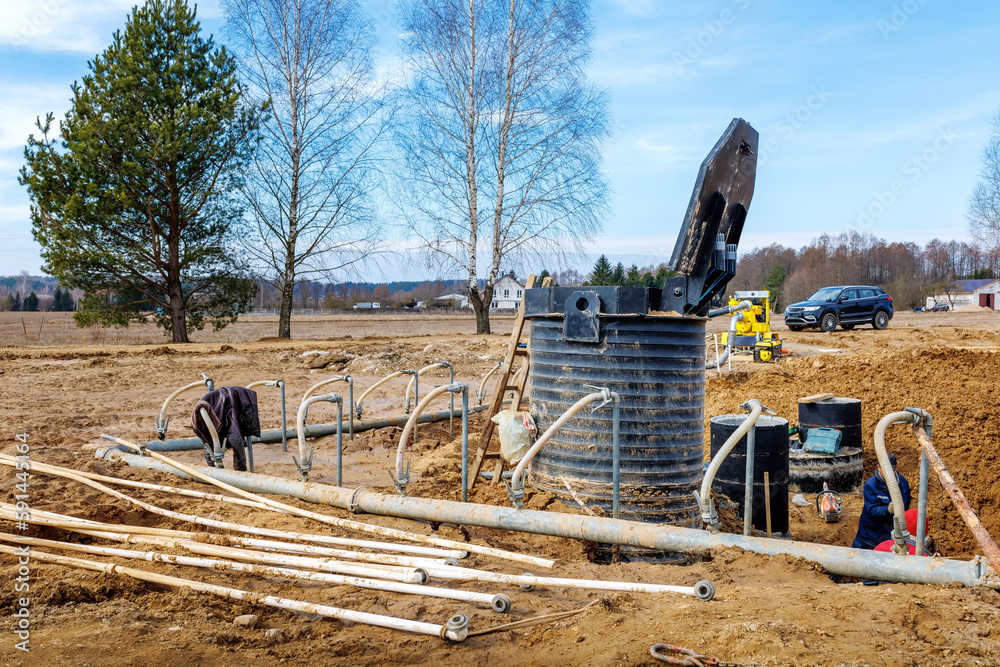 Works on the installation of a dewatering system in the open air with a ...