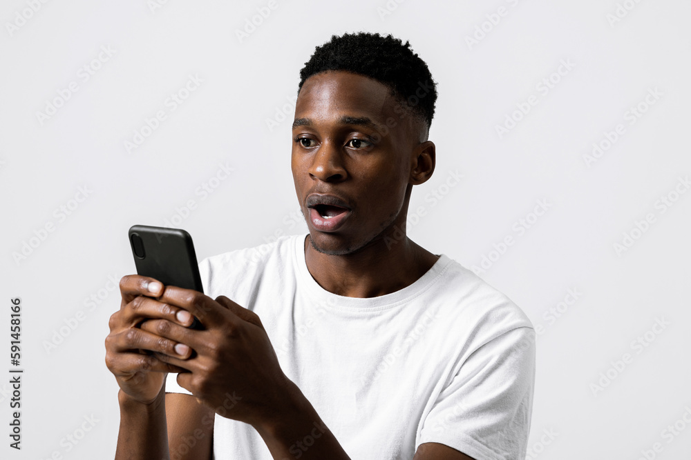 Portrait close up shot of african american black guy holding new modern ...