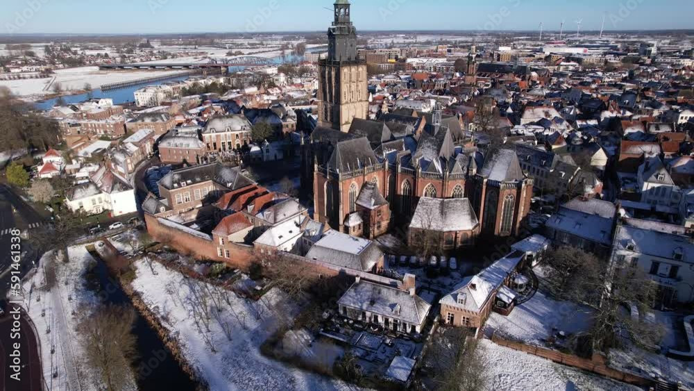 Ascending aerial reveal of original medieval wall Hanseatic Dutch tower ...