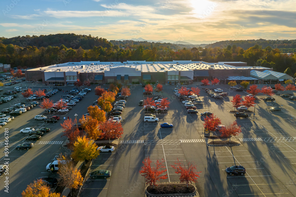 Aerial view grocery shopping mall and many colorful cars parked on ...