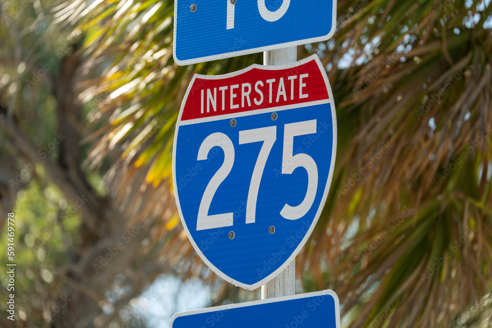 Blue direstional road sign indicating direction to I-275 freeway ...