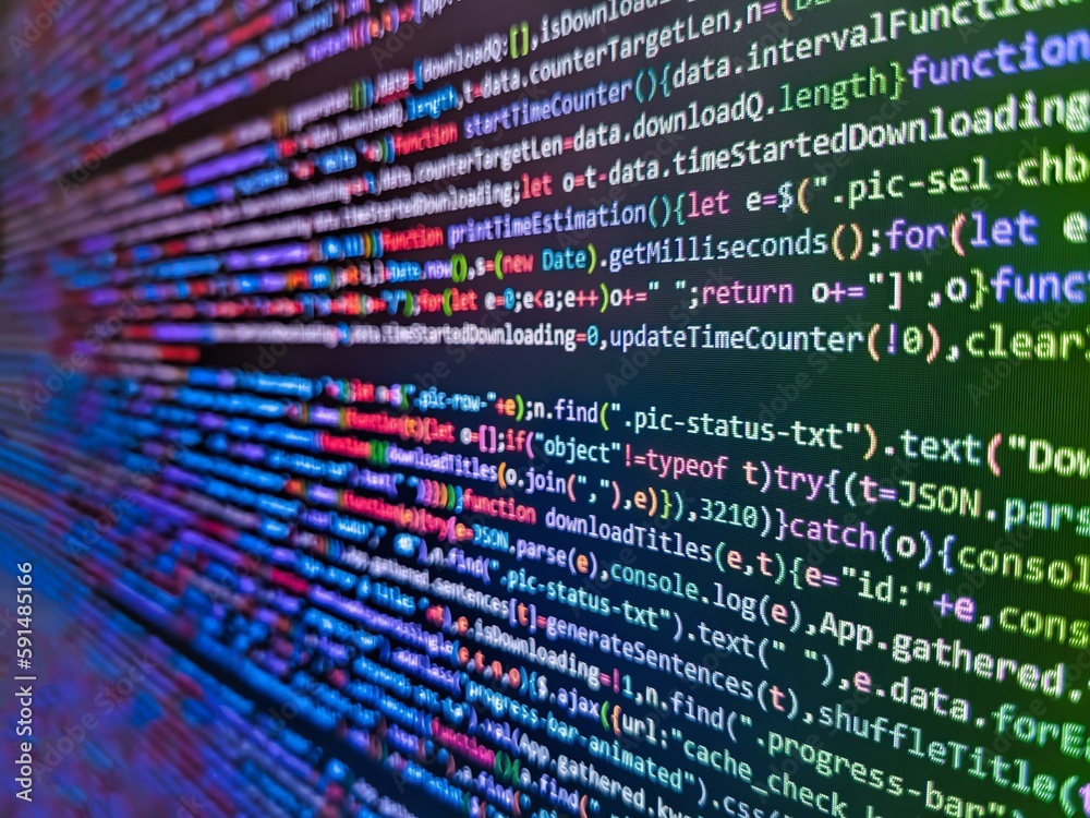 Software development. Programmer typing new lines of HTML code ...