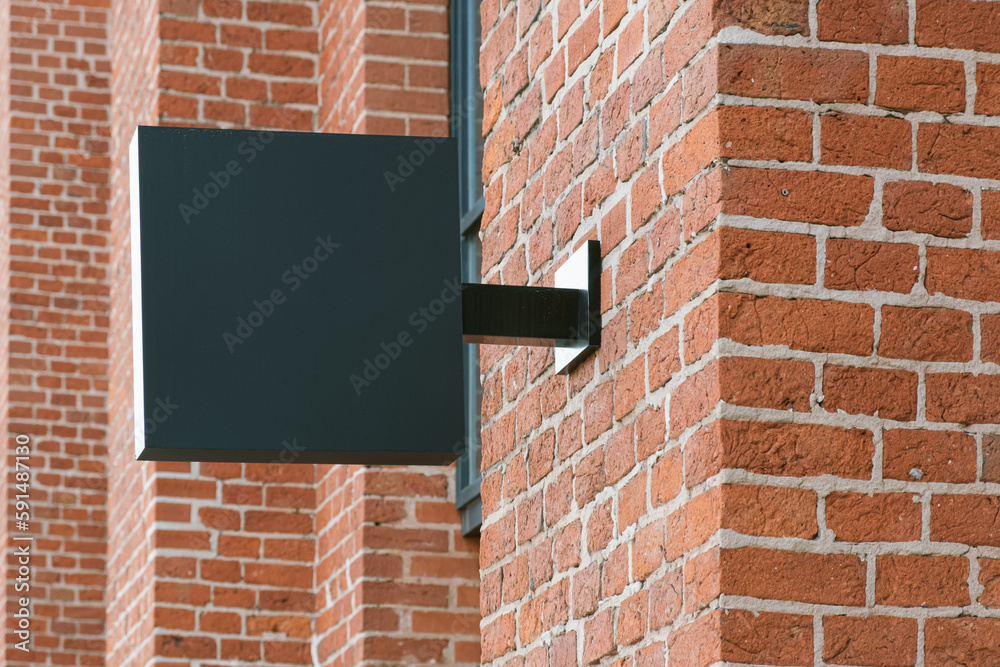 Blank square signs mock up in the urban environment on brick facade ...