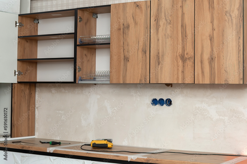 Installation and installation of a new modern kitchen in the house ...