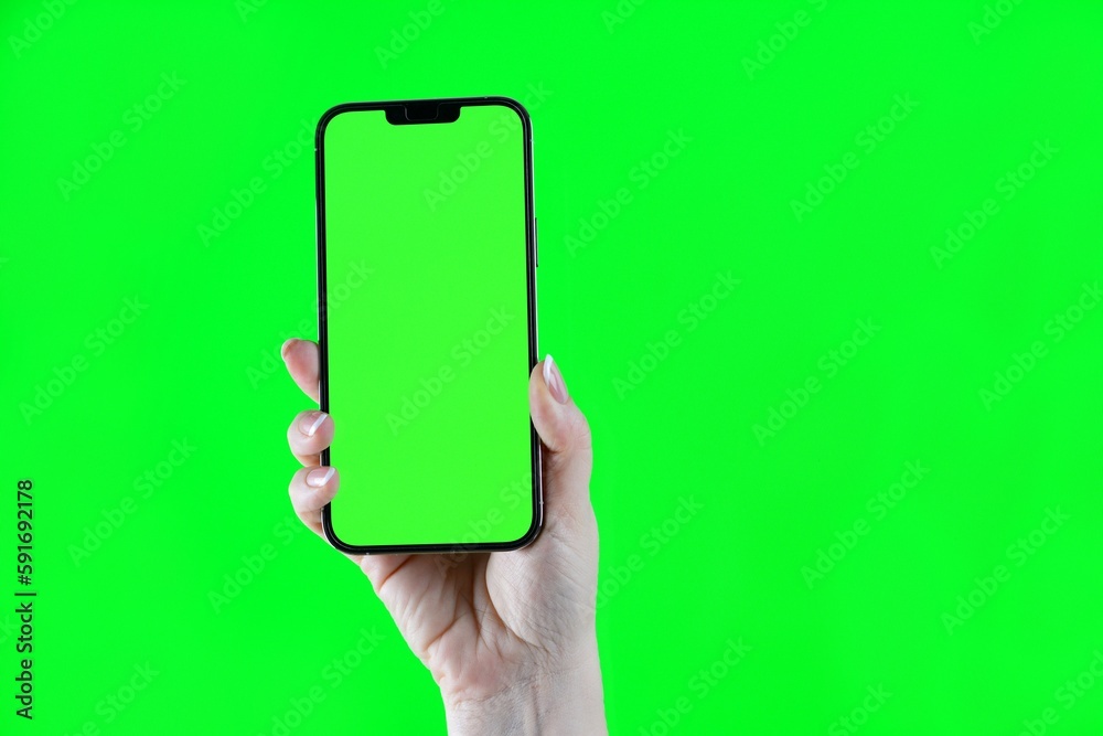 IPhone 13 pro max with a vertical green screen with a chrome key on a ...