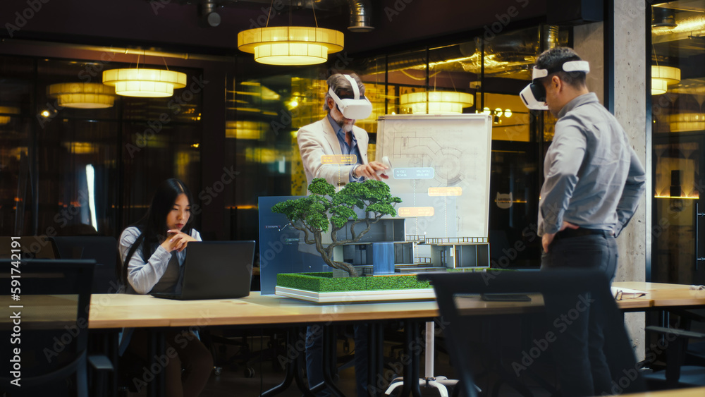 Diverse designers use VR headsets, make architectural project, create ...