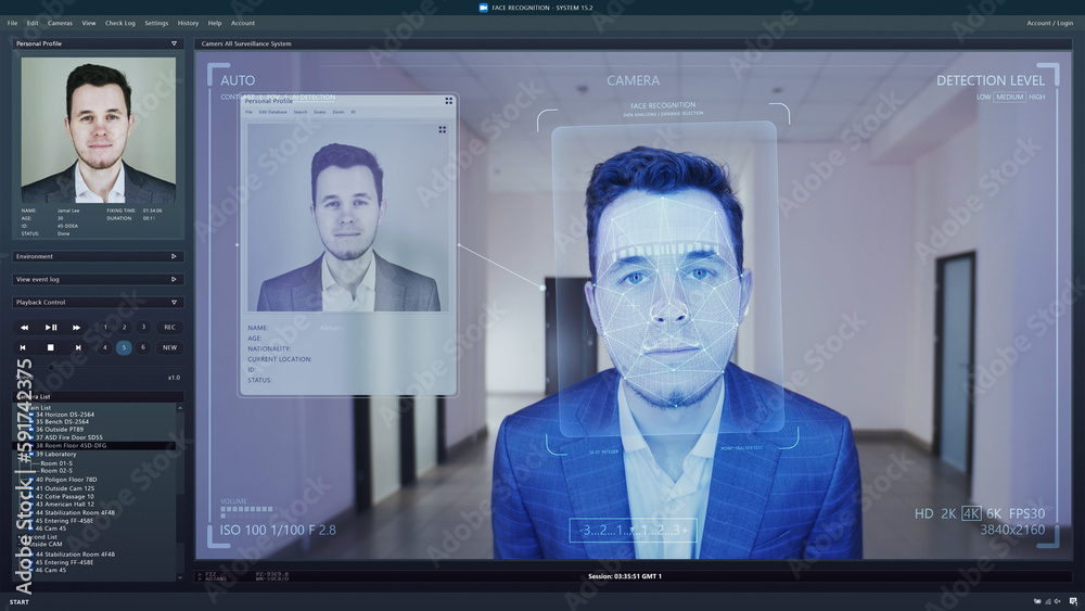 Businessman scans his face in office. Security system software ...