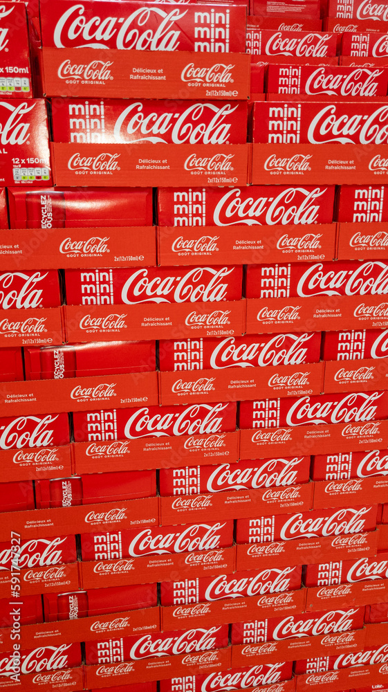 coca Cola sign brand and text logo on supermarket can bottle pyramid on ...