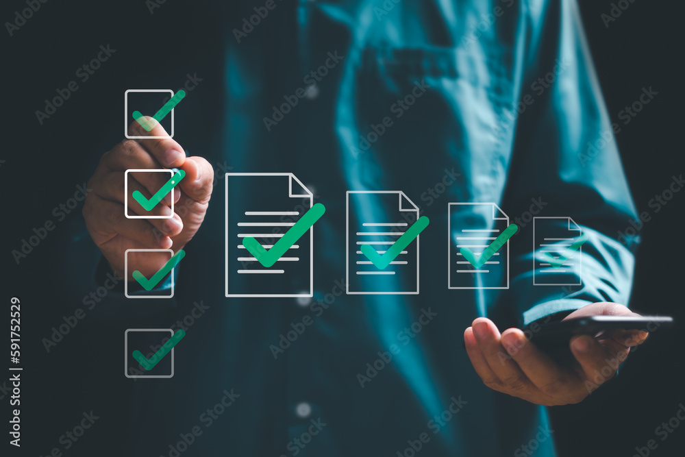 Foto de Document management and digital checklist concept ,Businessman ...