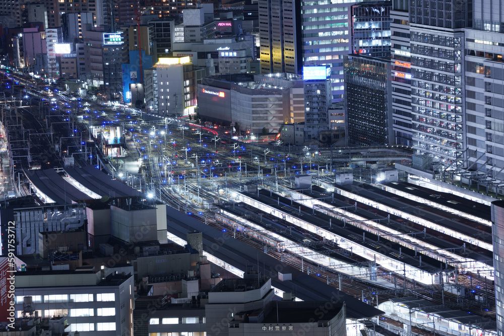 Aerial view of Nagoya station and its vicinity downtown area with high rise buildings at night ...