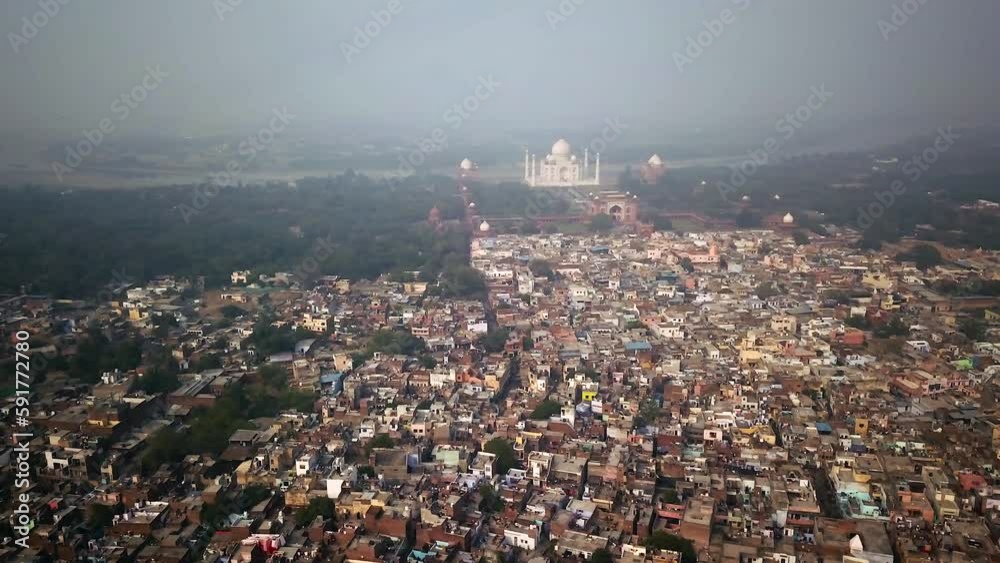 Famous from afar distance of Taj Mahal aerial Arga India rural busy ...